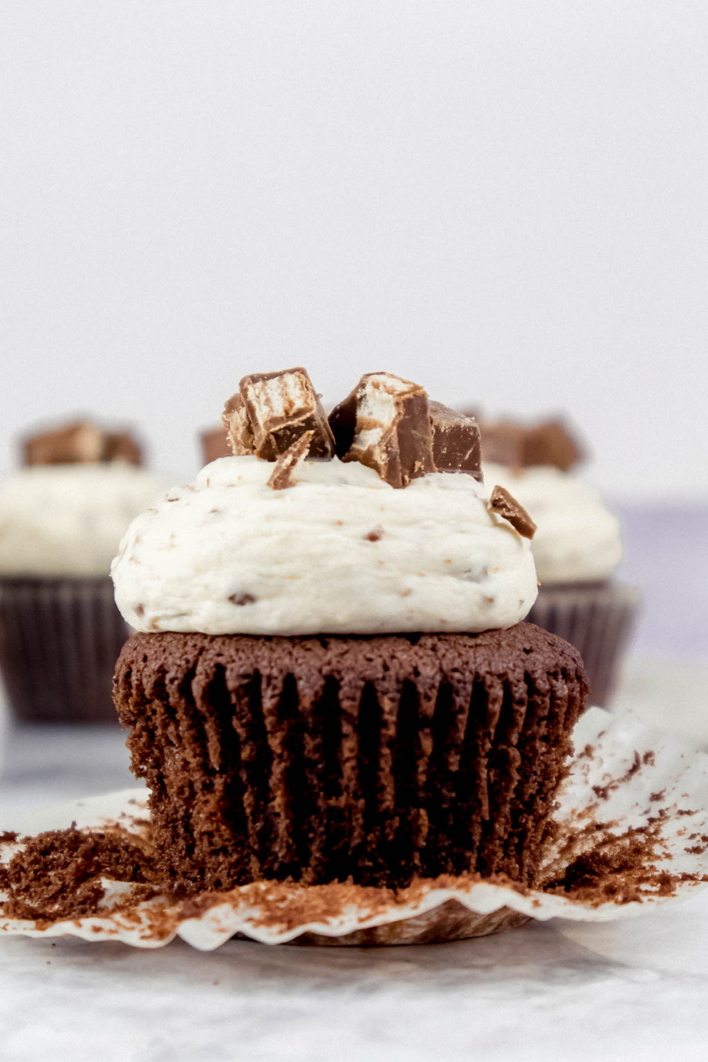 Kit Kat Cupcakes with Kit Kat Buttercream - Crumbs and Corkscrews